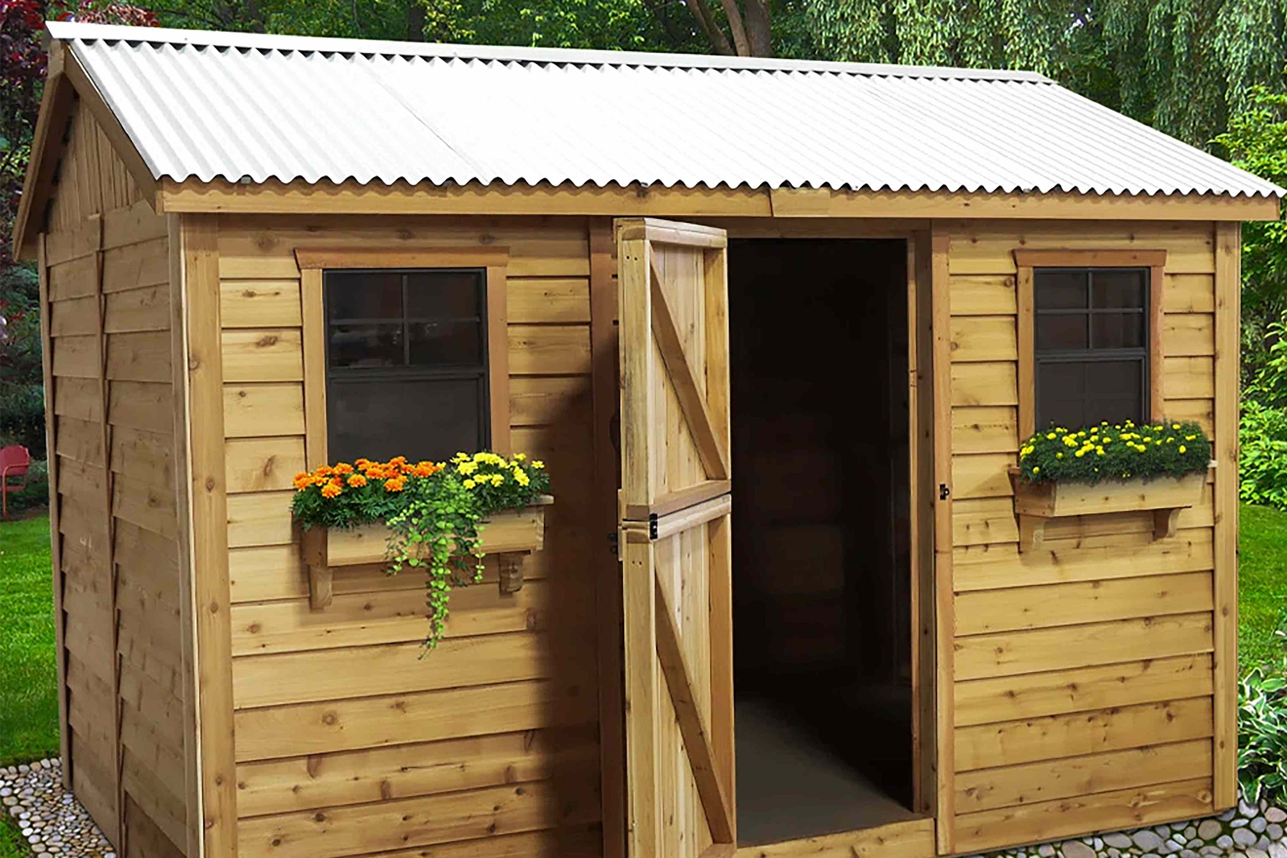 We Found A Tiny House With Charming Flower Boxes And A Dutch Door For ...