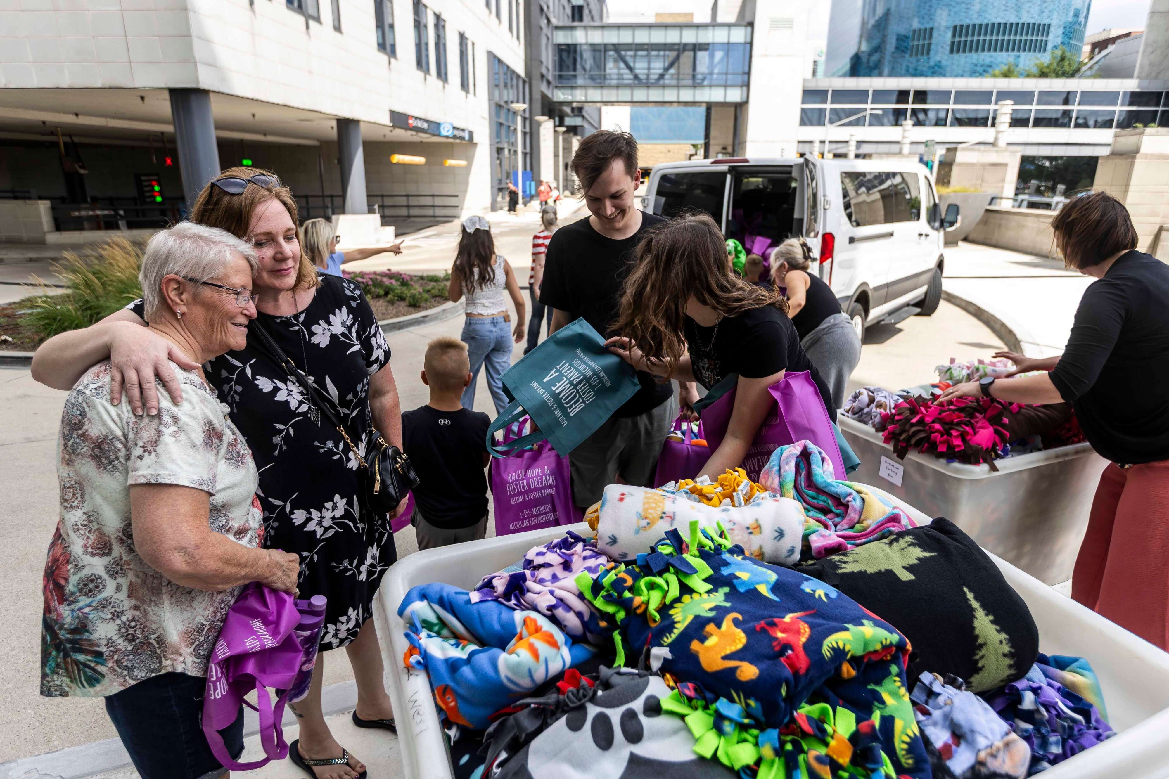 Leukemia survivor donates 200 handmade blankets to West Michigan hospital