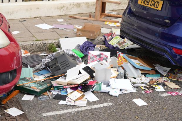 Pictures show emergency response after contents of flat thrown out of ...