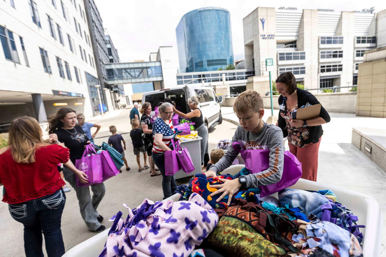 Leukemia survivor donates 200 handmade blankets to West Michigan hospital
