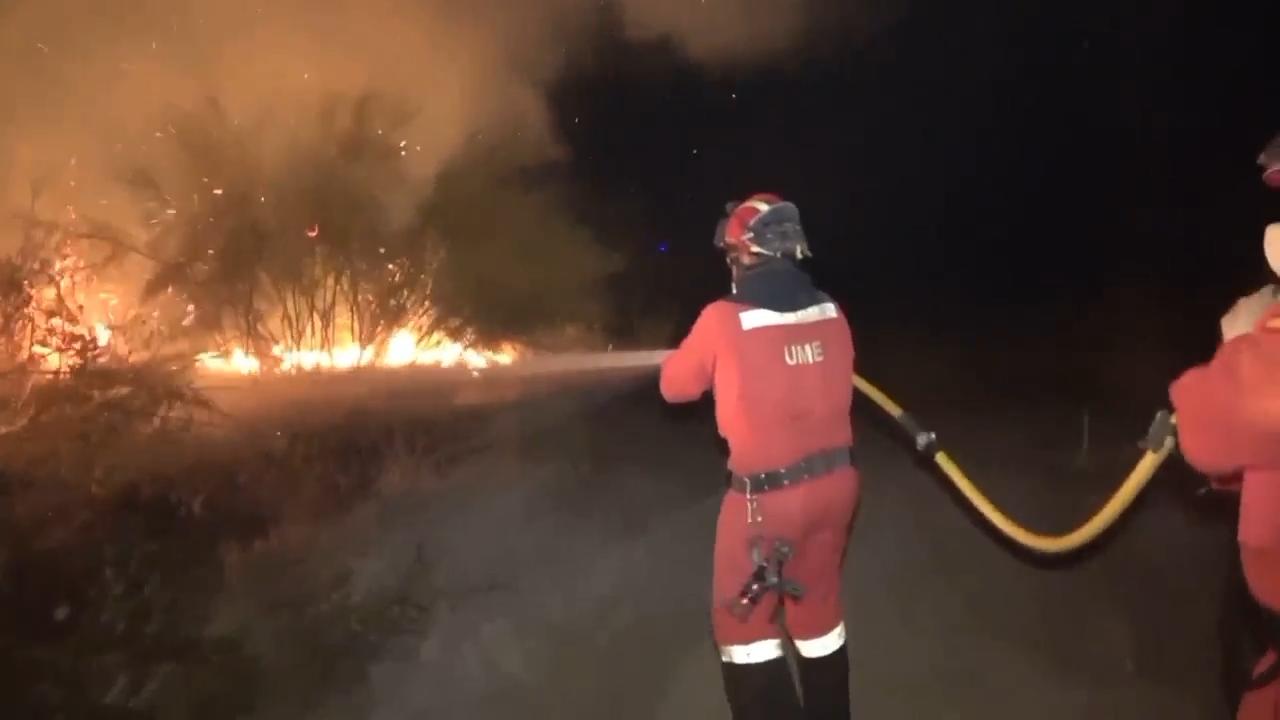 Spanish firefighters work through the night as wildfires continue to ...