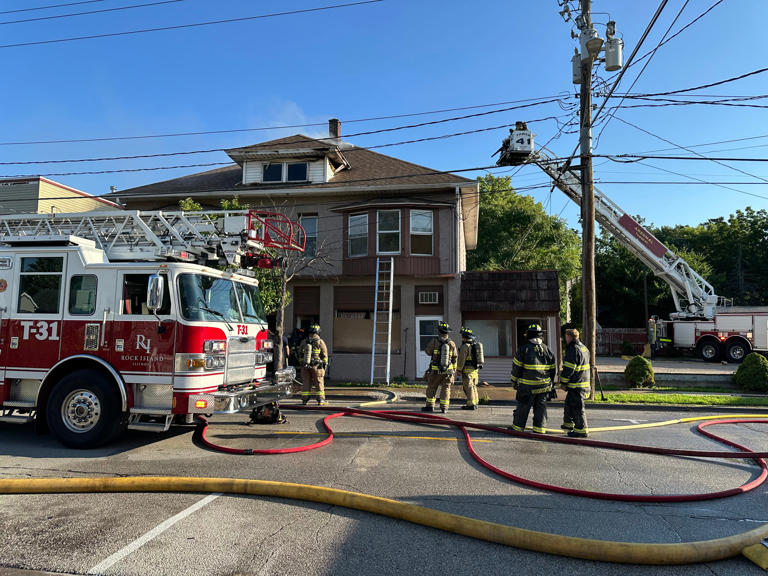 Smoke billows over Rock Island skyline from fire vacant building