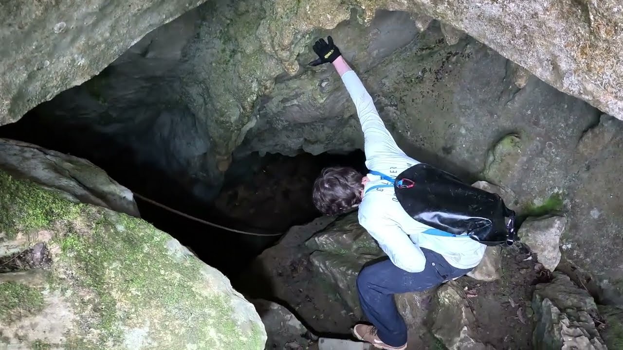Cliffside Hole Opens Into Giant Underground Cave