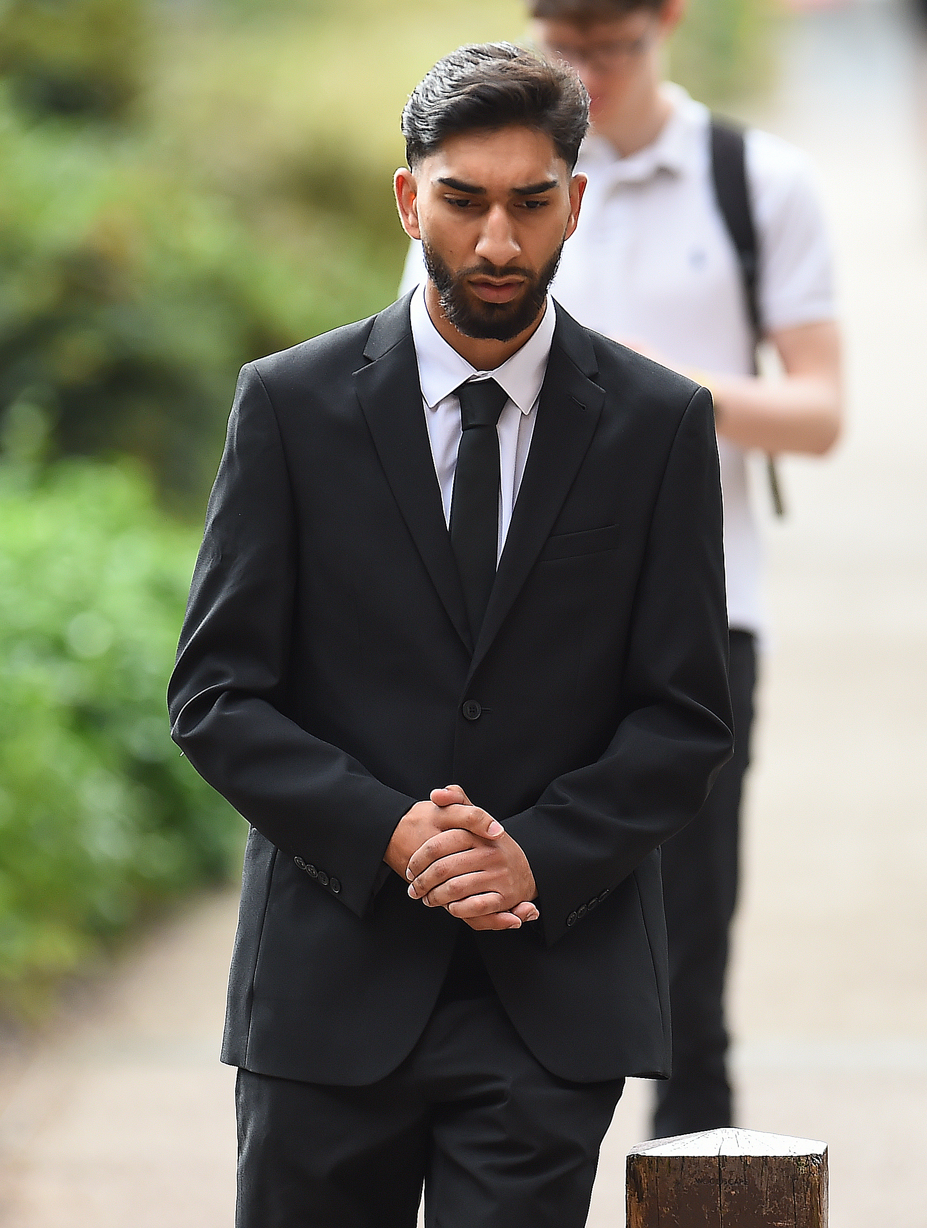 Student tells court he did not know police officers he hit at airport ...