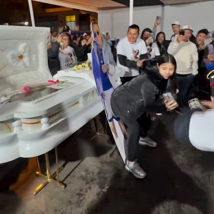 Wild video shows widow twerking on a cardboard cutout of her late ...