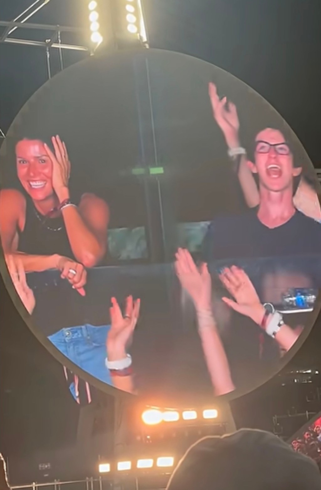 Embarrassed brunette on Coldplay kiss cam misidentified online as ...