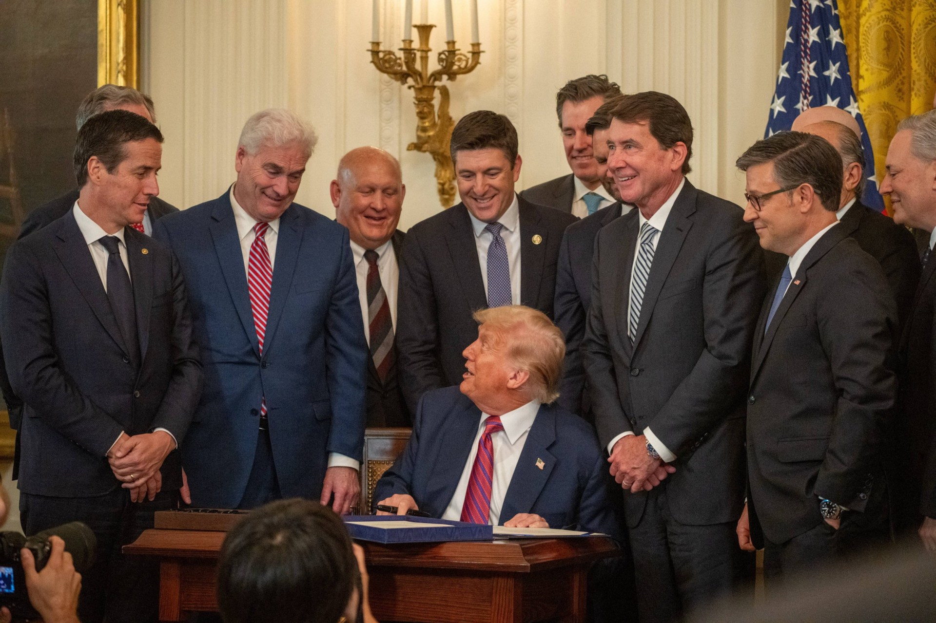 Trump ignores Epstein questions at Genius Act signing