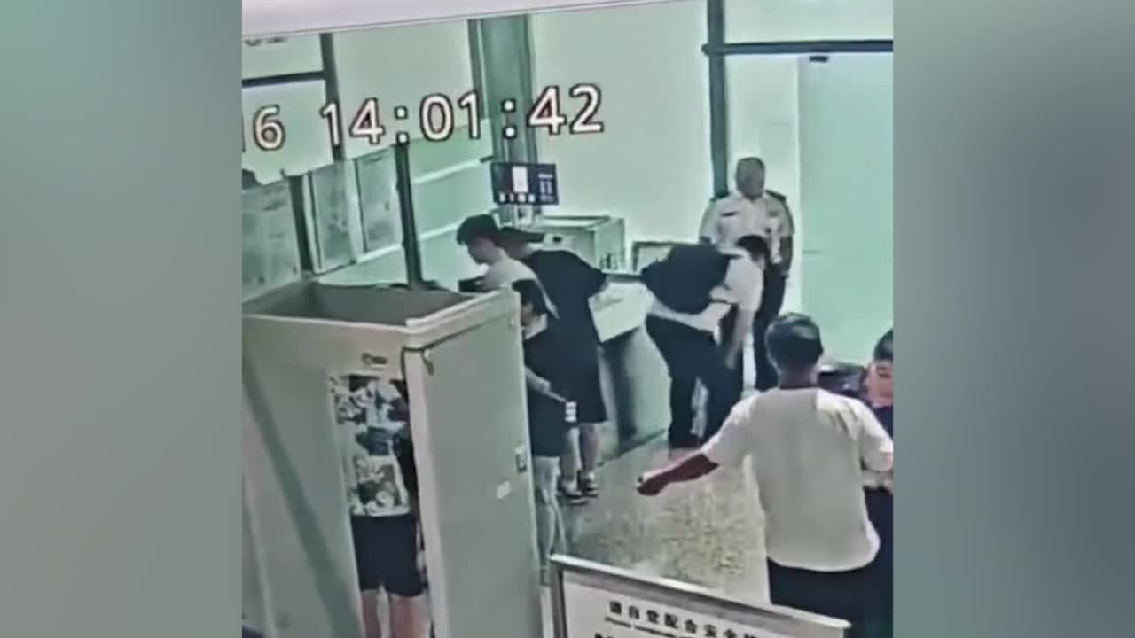 Angry passenger throws power bank to ground when airport staff stop him ...