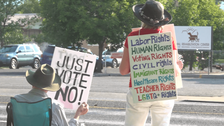 Protesters lined North 12 Street for “Good Trouble Lives On” protest