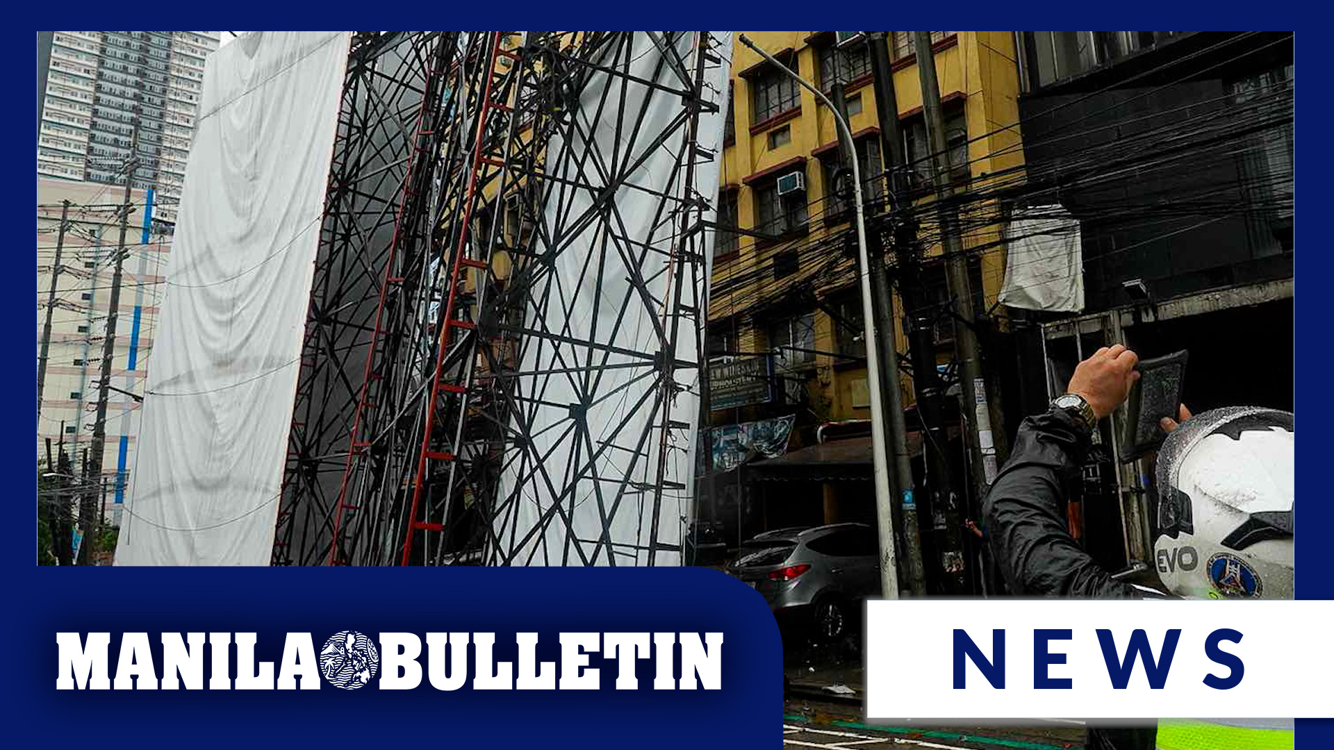 Billboard, utility post collapse in QC