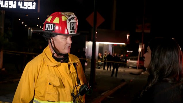 Fire department say one person treated in LA car crash had gunshot wound