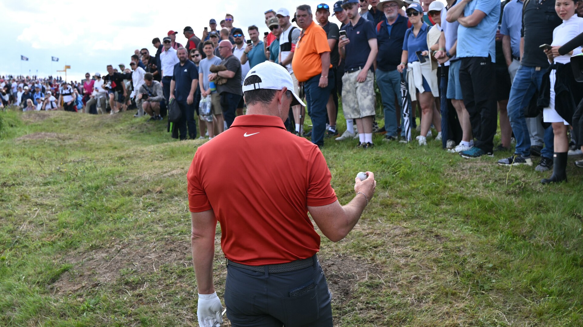Rory McIlroy hits two balls in one shot during wild third round at The Open