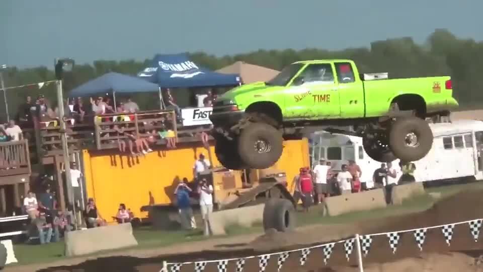 Green Monster Truck Crashes during Jump