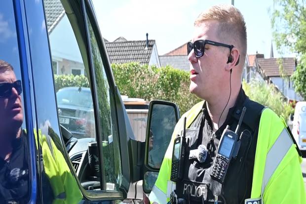 Watch traffic cops catching criminal drivers red-handed