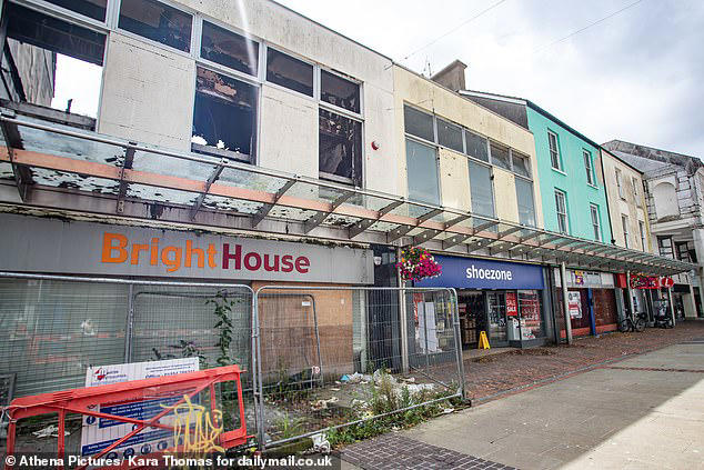 Locals in once-bustling town blast boarded up shops as they claim ...