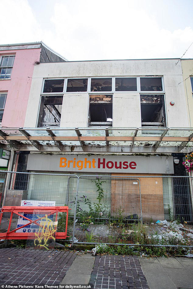 Locals in once-bustling town blast boarded up shops as they claim ...