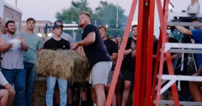 Iowa OL Kade Pieper defends Solon Beef Days hay bale toss title with 13 ...