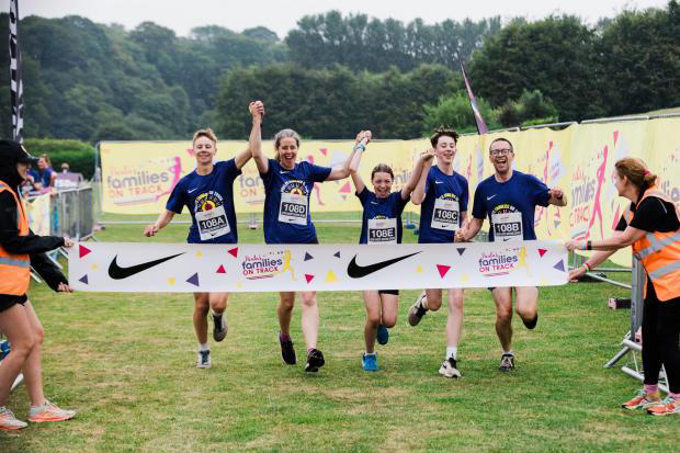 Families 'stay on track' despite wet weather at Durham City Run ...