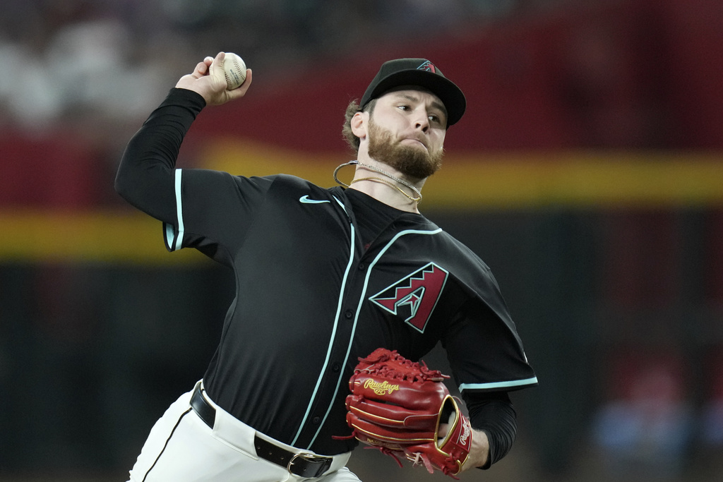 Suarez hits 32nd and 33rd homers as Diamondbacks rout Cardinals 10-1