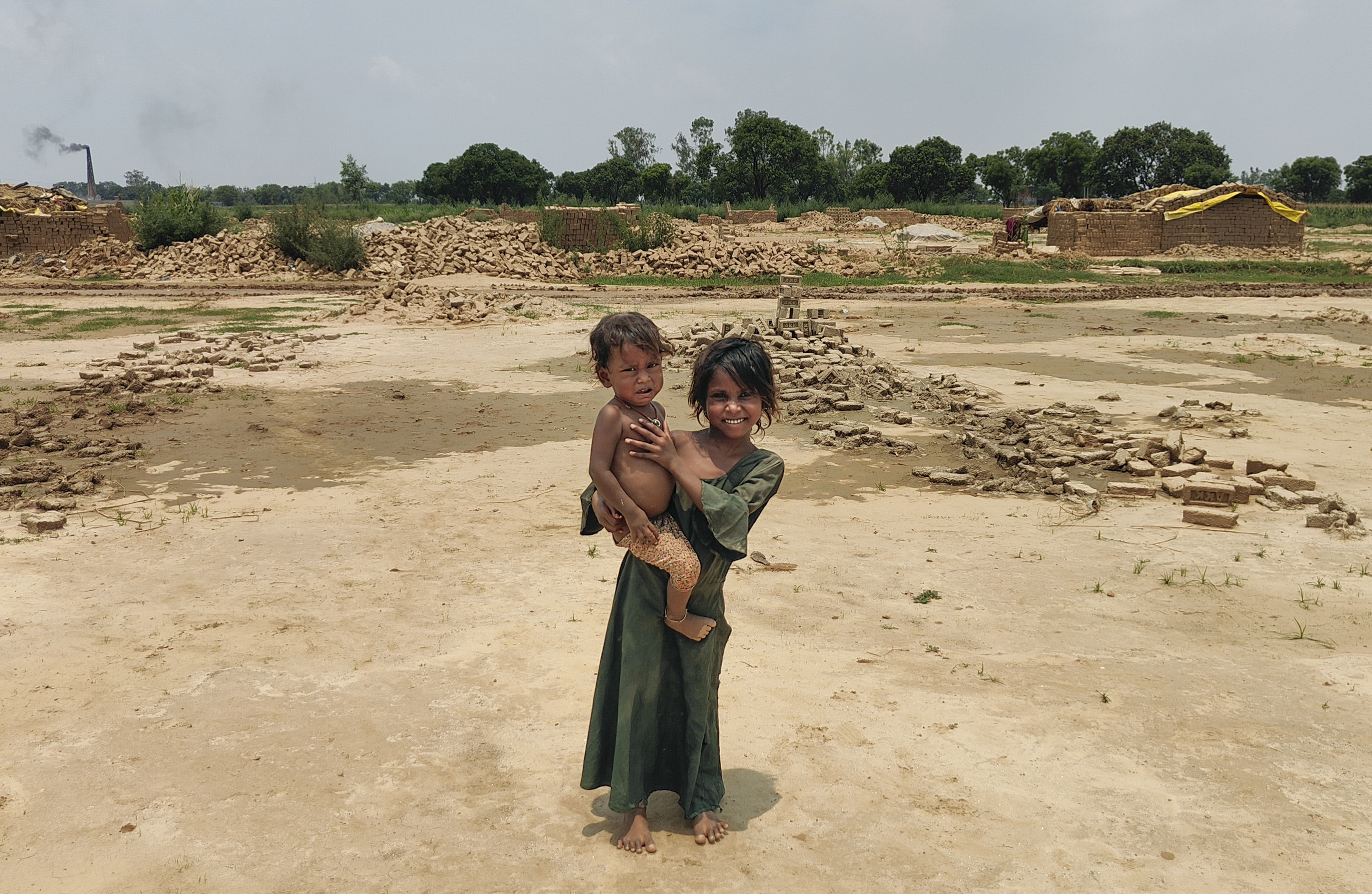 Too young to work, too poor to stop: Children of brick kiln migrants ...