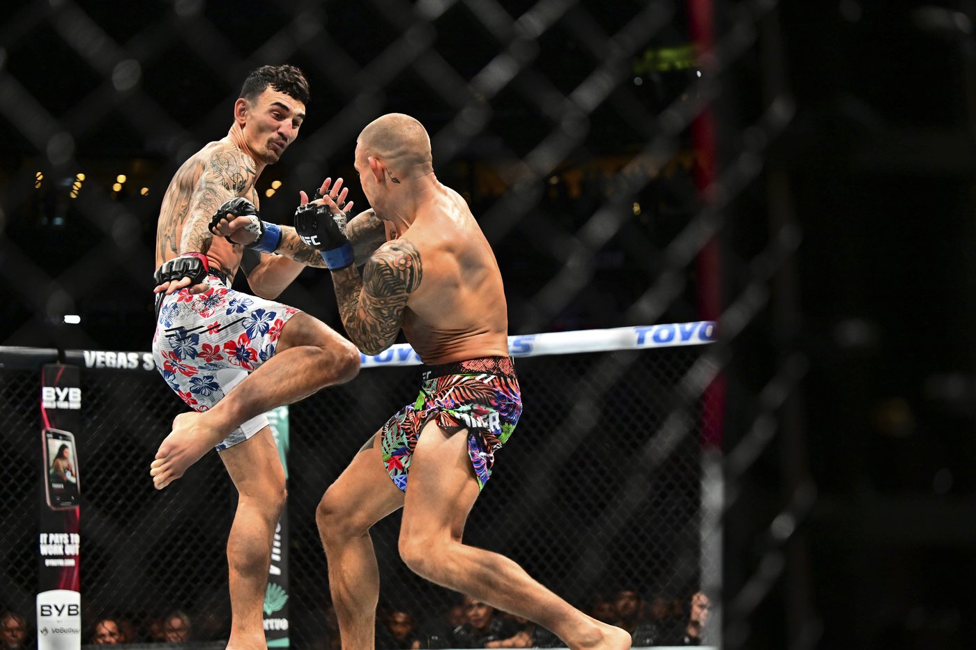 Max Holloway retains UFC BMF title, spoils Dustin Poirier's retirement ...