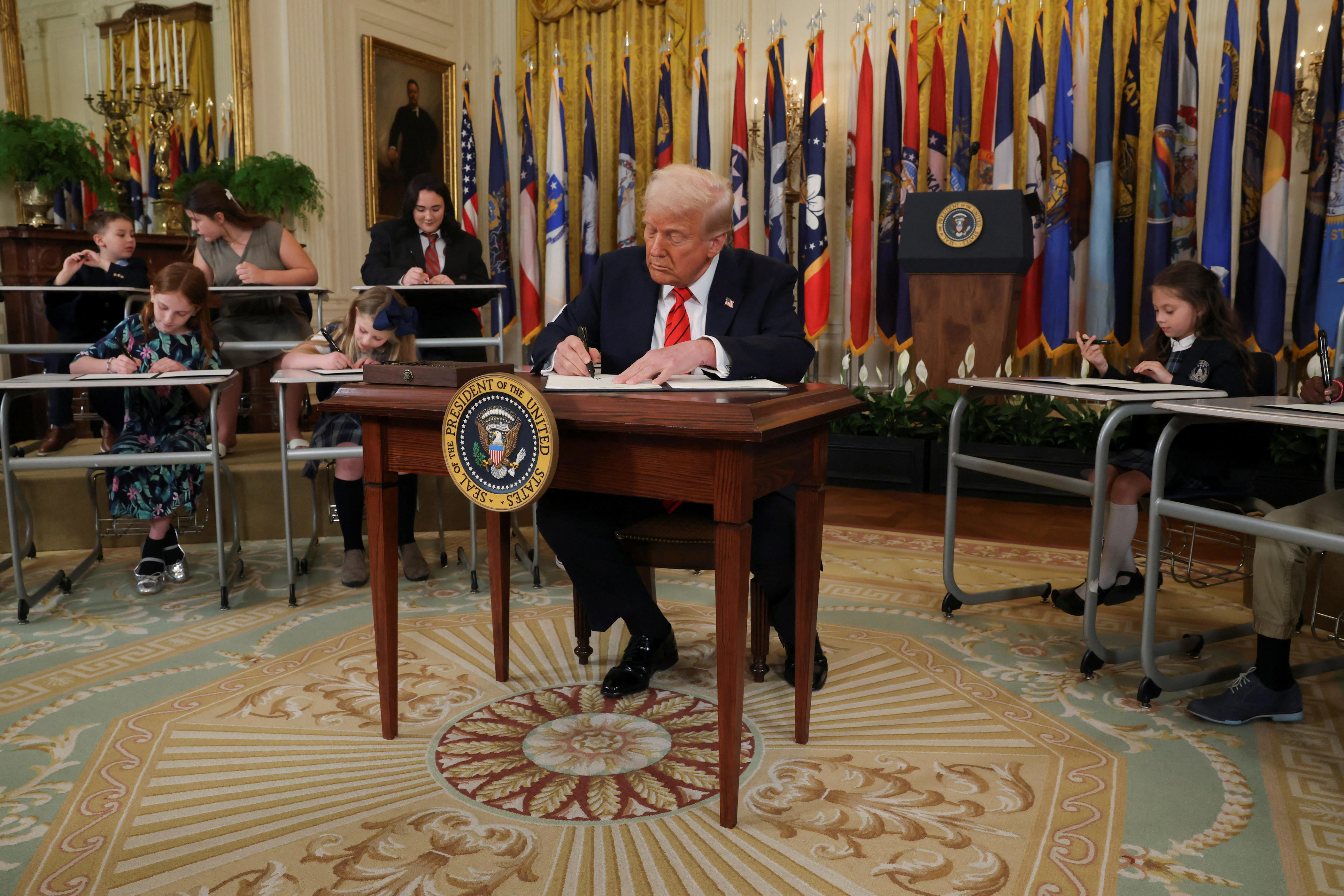 Trump proudly unveils construction on two new White House flag polls ...