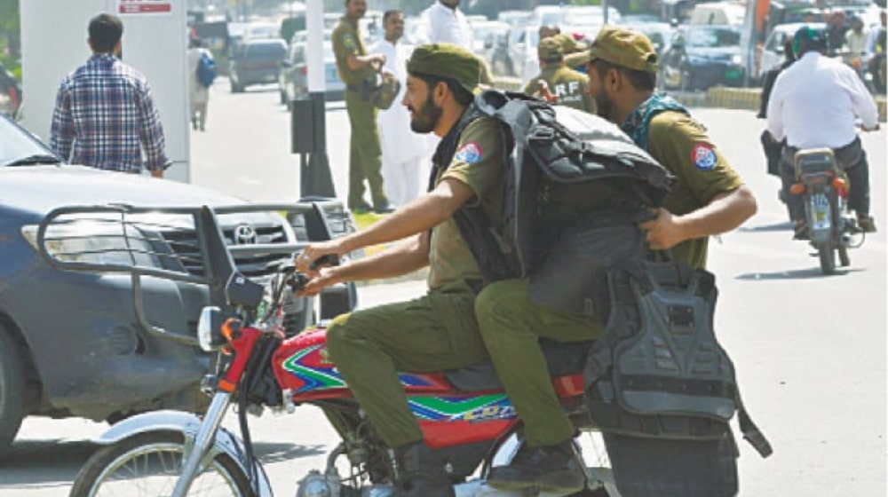 Helmetless cops in Lahore flee scene, mock traffic police drive