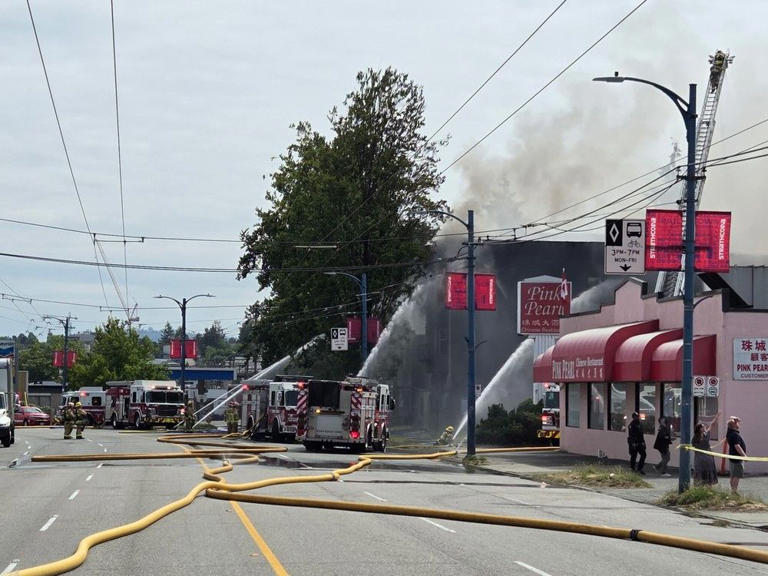 Photos: Fire erupts next to Pink Pearl restaurant in east Vancouver