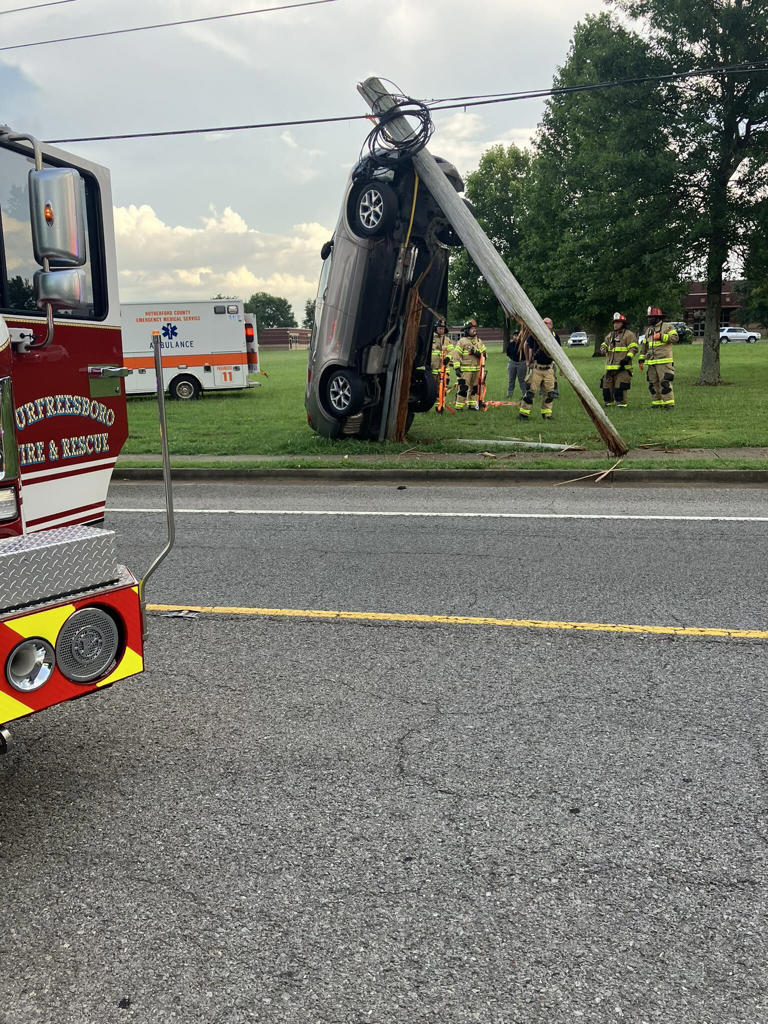 Car gets stuck on utility pole after crash in Murfreesboro