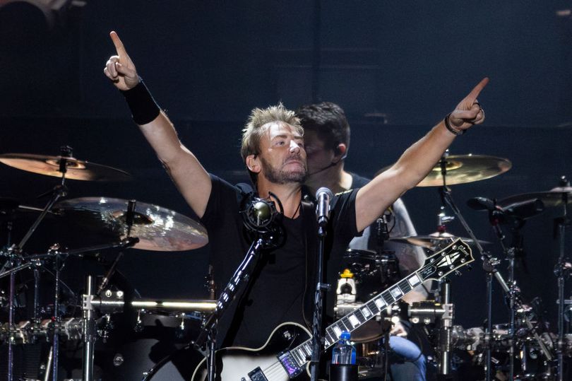 Nickelback lead singer makes brutal two-word joke about Coldplay kiss ...