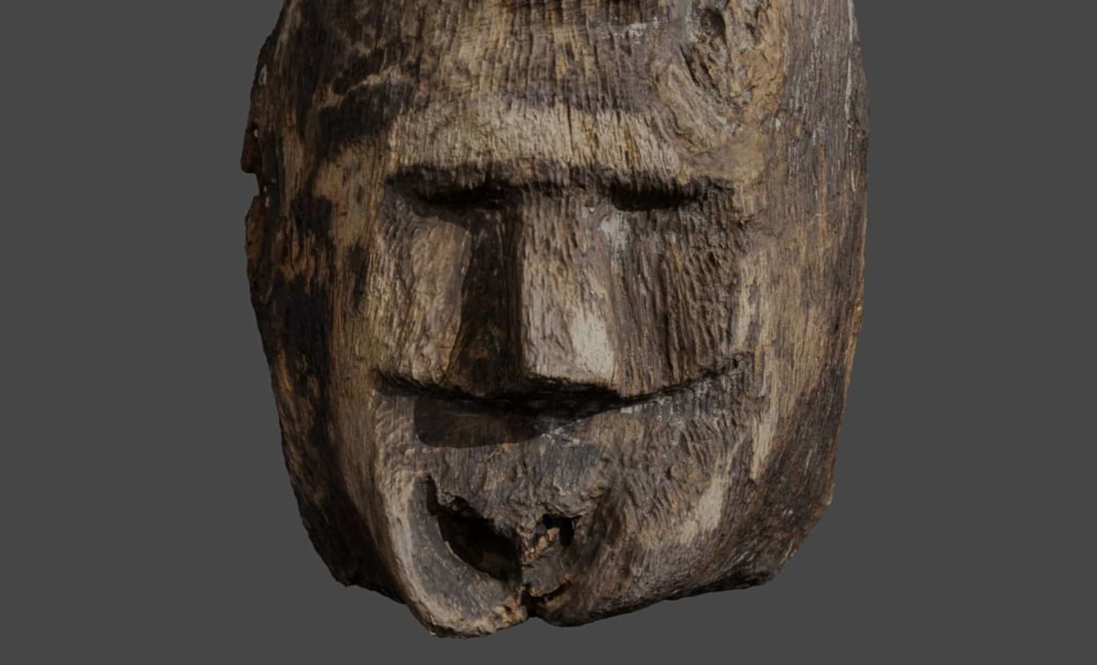Divers Uncover a 1,000-Year-Old Haunting Ancient Face in Poland