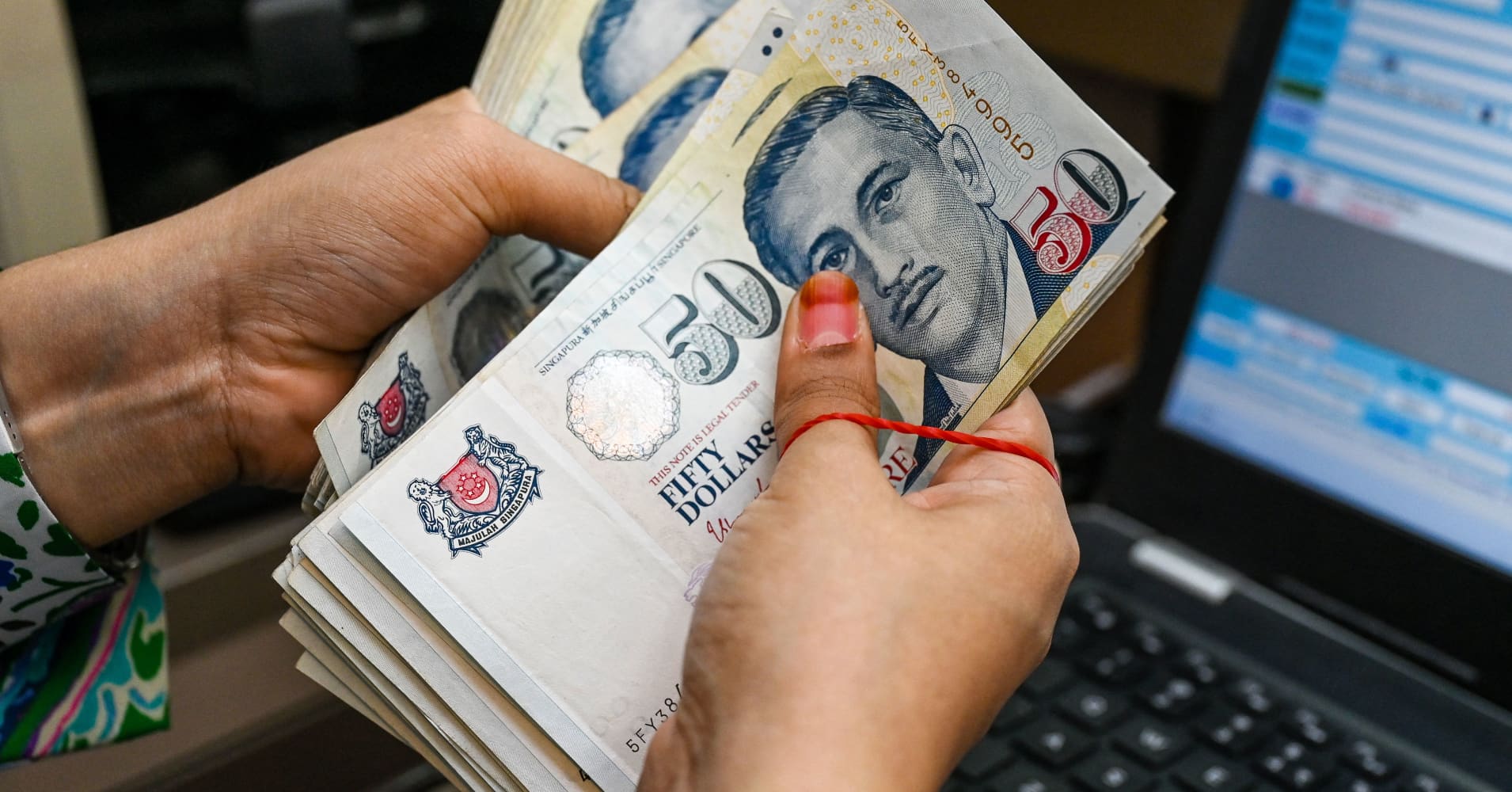 Singapore dollar exhibits safe-haven currency features. But it's no yen ...