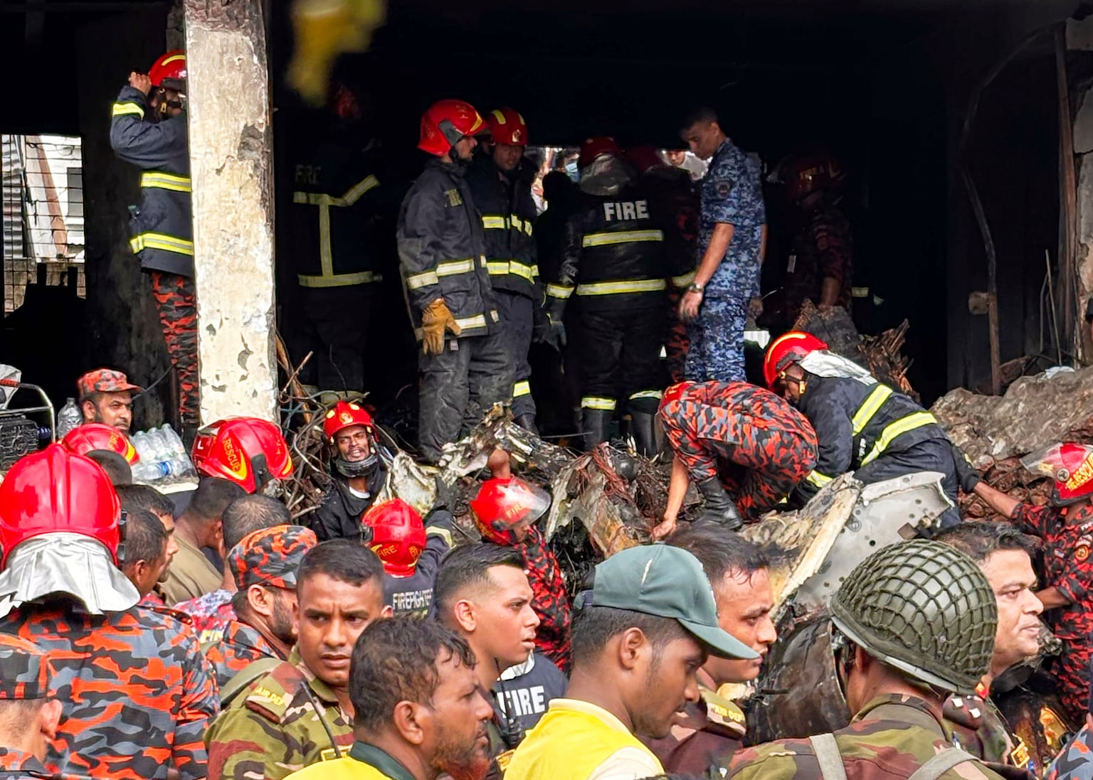 Bangladesh Air Force jet crashes into a Dhaka school and kills 19