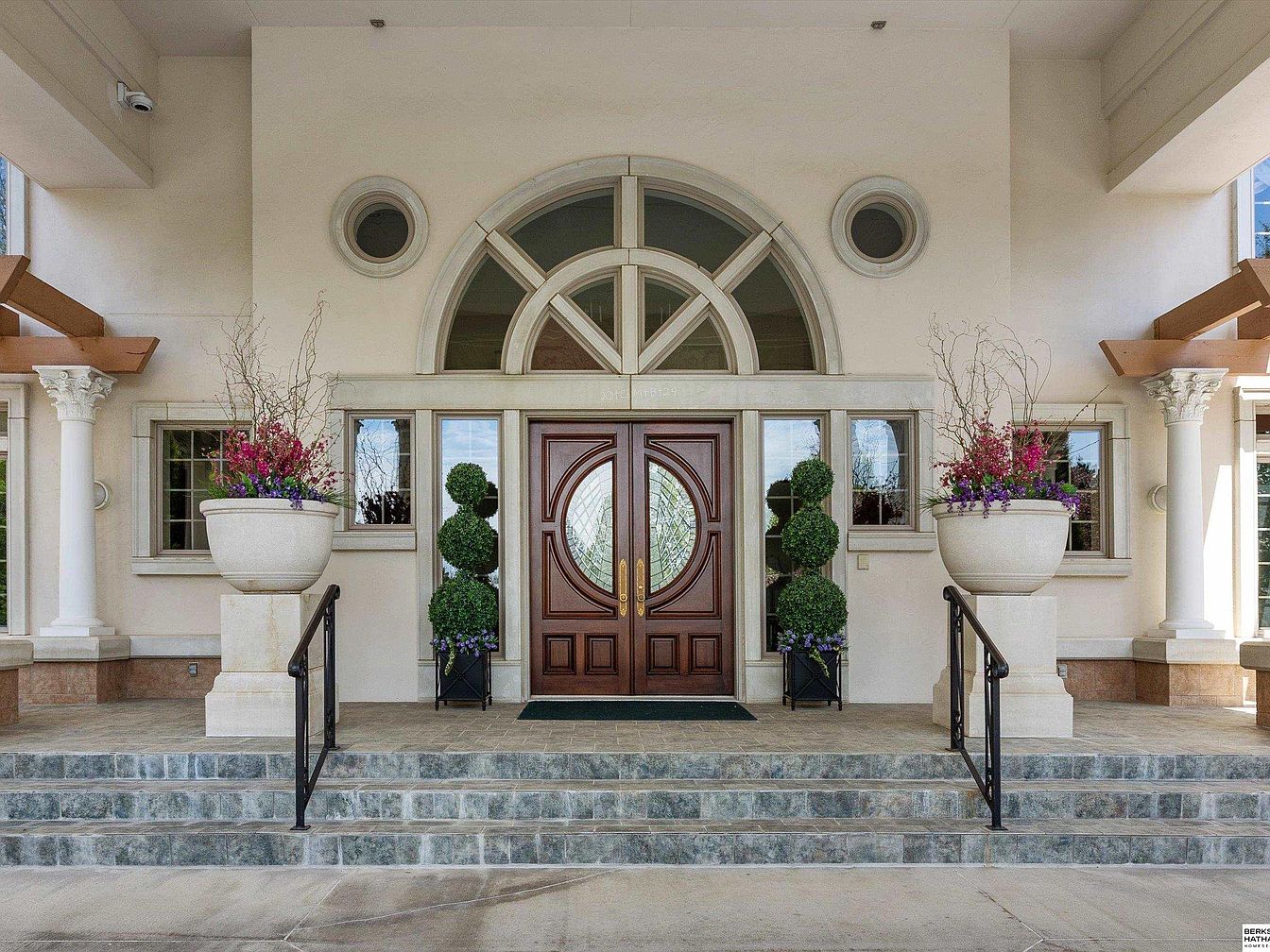 Iconic Omaha Family Estate with Resort-Style Pool, Double Staircase ...