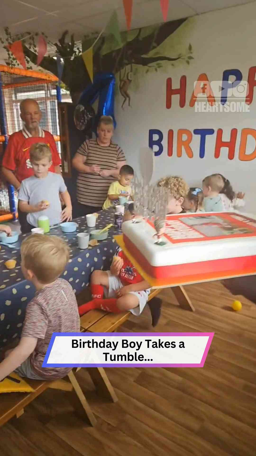 Comical Birthday Moment as Lad Falls Off Bench Before Blowing Out Cake ...