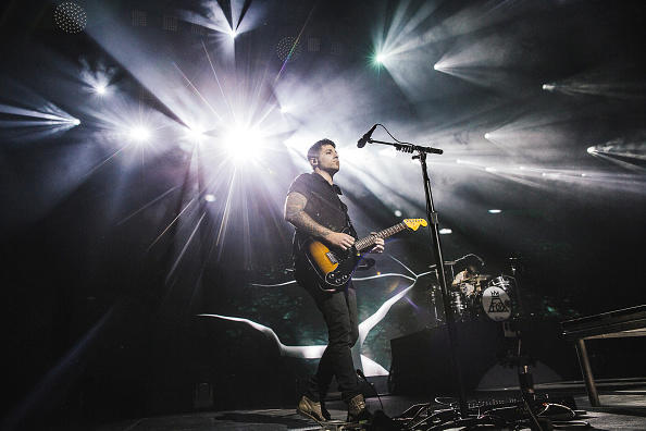 Fall Out Boy star steps away over hand injury fears
