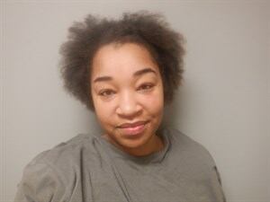 Woman accused of assaulting corrections officer