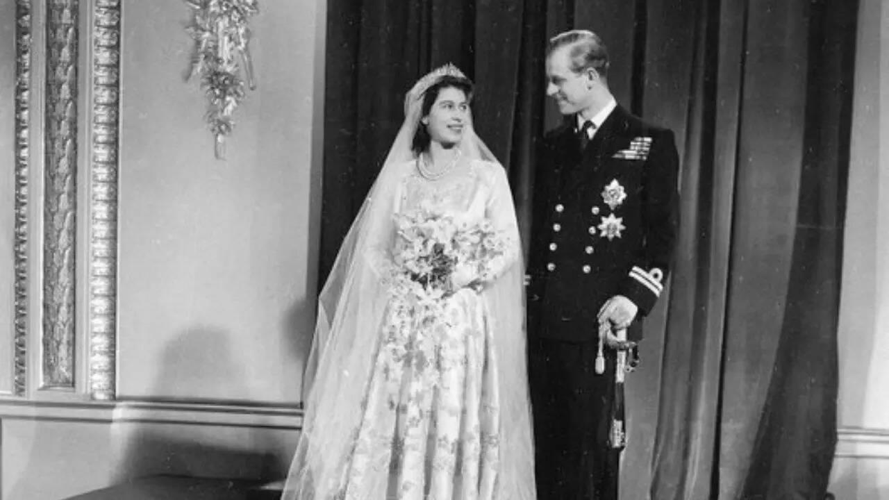 Queen Elizabeth's wedding cake slice sold at an auction: New owner ...