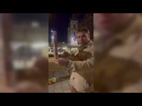 Man Bumps into Pole While Eating Pizza