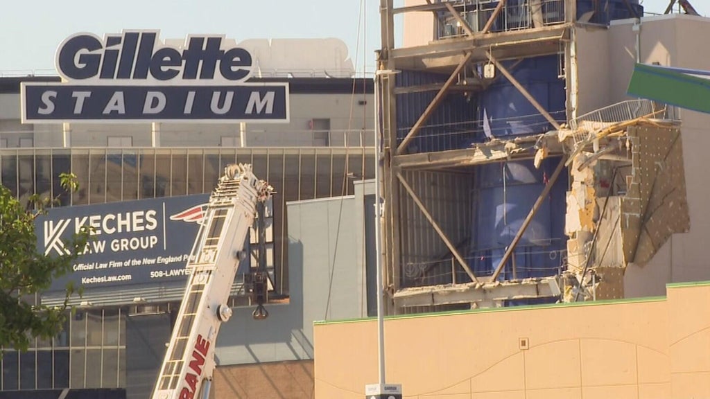 Freedom Wind Tunnel demolition debris catches fire at Patriot Place ...