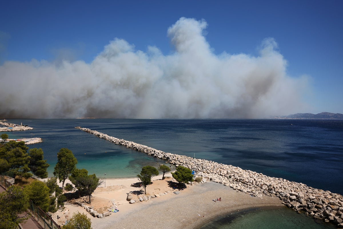 Marseille wildfire latest: Huge blaze rages on edge of French city and ...