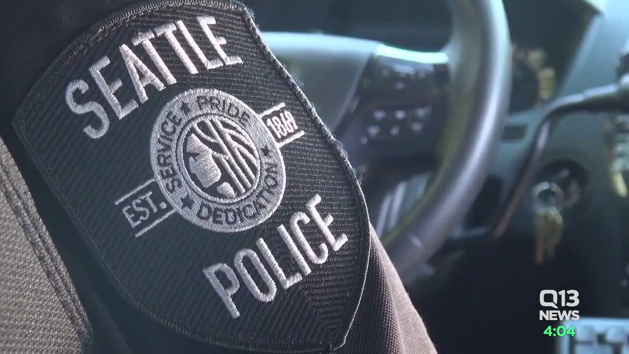 Seattle police search for suspect after officer struck by stolen SUV