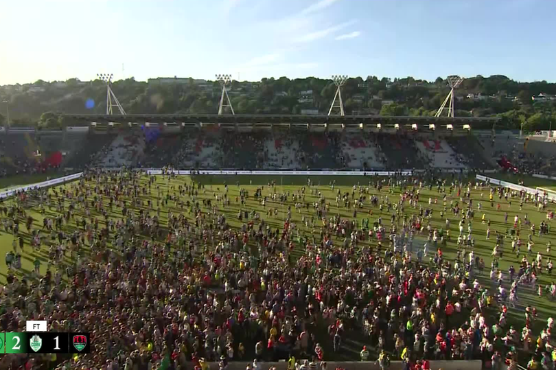 Celtic fans invade Pairc Ui Chaoimh pitch after winning pre-season trophy