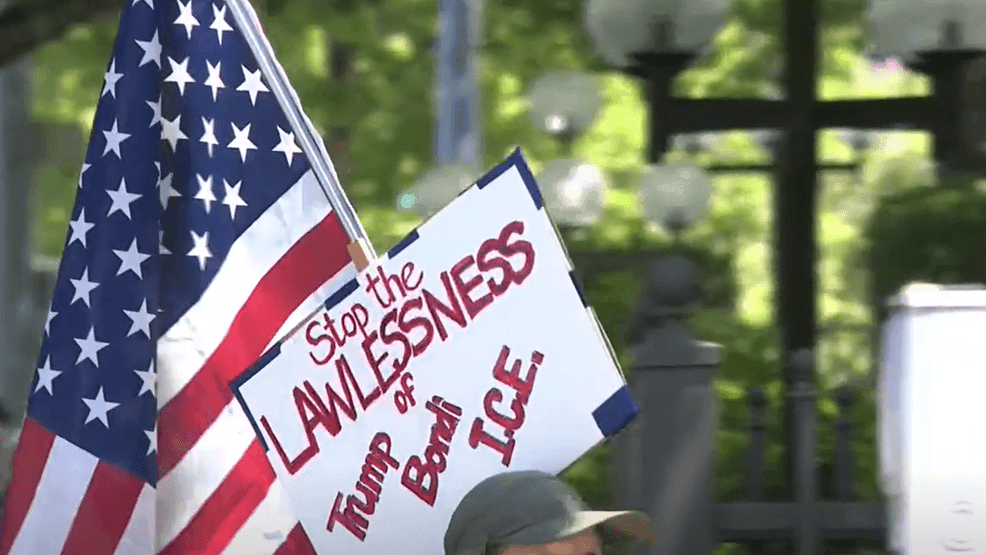 Protesters rally outside Eugene Federal Building for transparency from ...