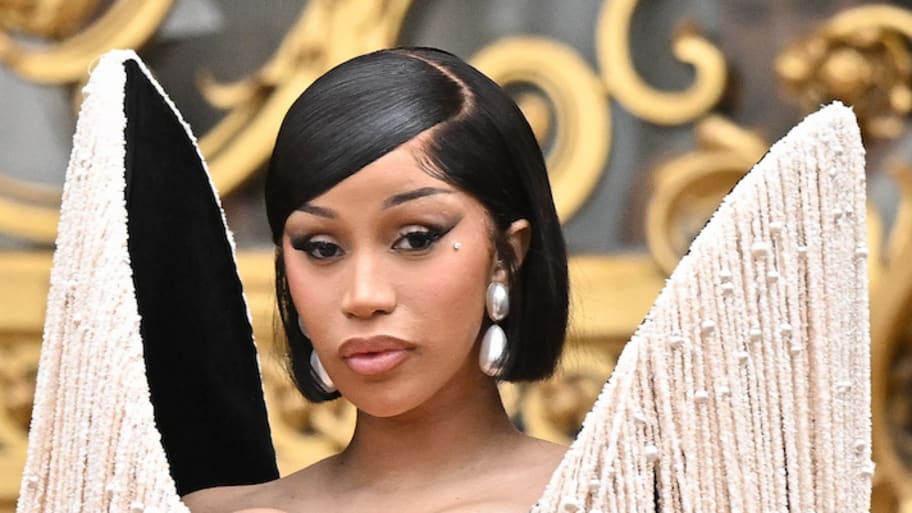 Cardi B Stuns Fans In Paris Dons Designer Gown With Wild Accessory