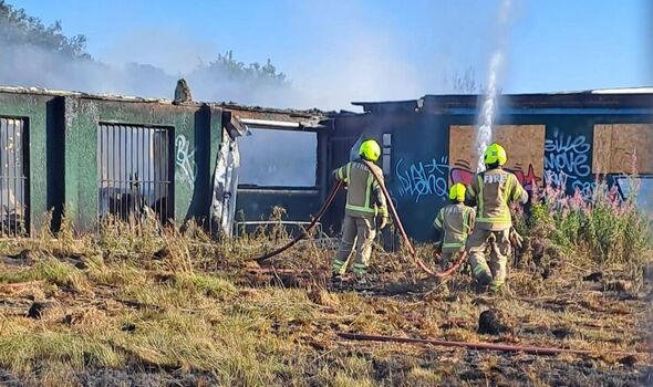 Locals told 'close windows and doors' as 60 firefighters tackle blaze ...