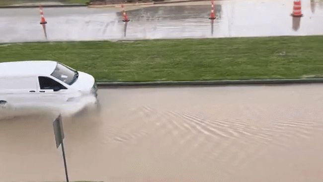 Van Speeds Through Deep Flooding Outside Houston