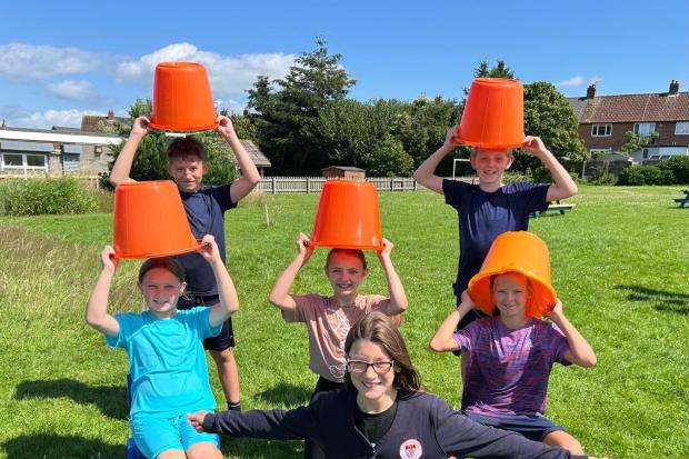 Primary schools unite for ice bucket charity challenge