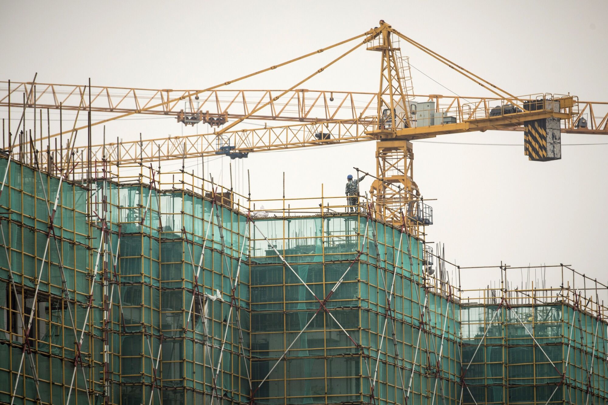 New World Is Selling China Property Assets After Loan Deal