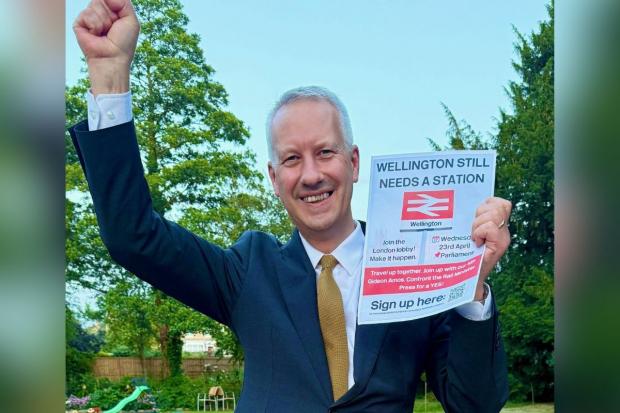 Wellington MP Gideon Amos celebrates approval of new rail station